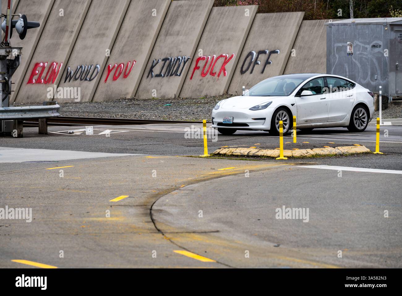 Seattle, USA. 21st Mar 2025. Anti Elon Musk graffiti on the Seattle ...