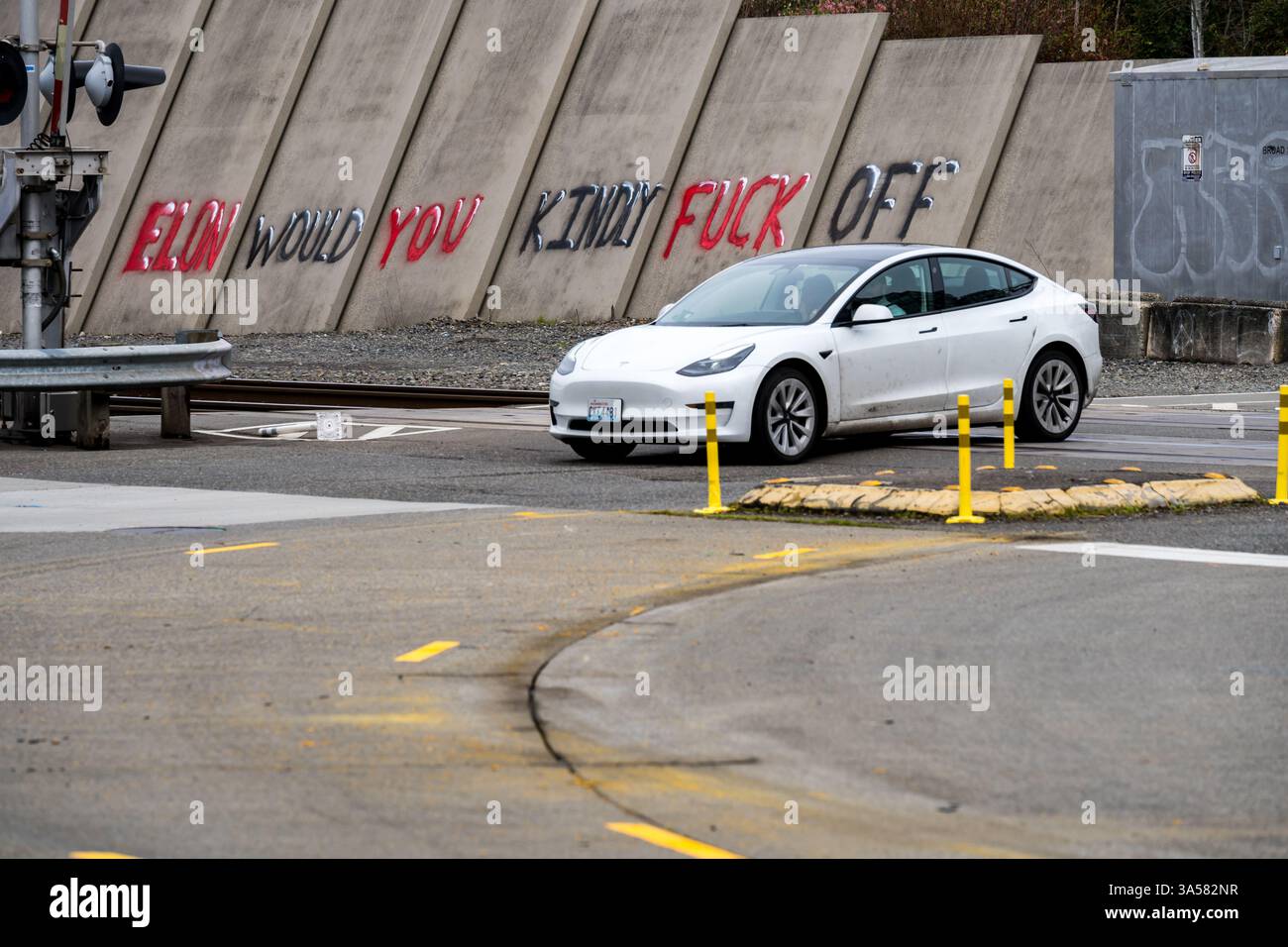 Seattle, USA. 21st Mar 2025. Anti Elon Musk graffiti on the Seattle ...