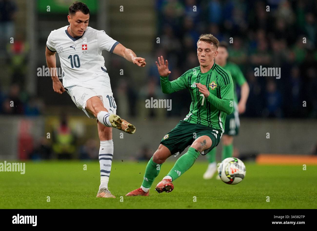 Switzerland's Vincent Sierro (left) and Northern Ireland's Ethan ...