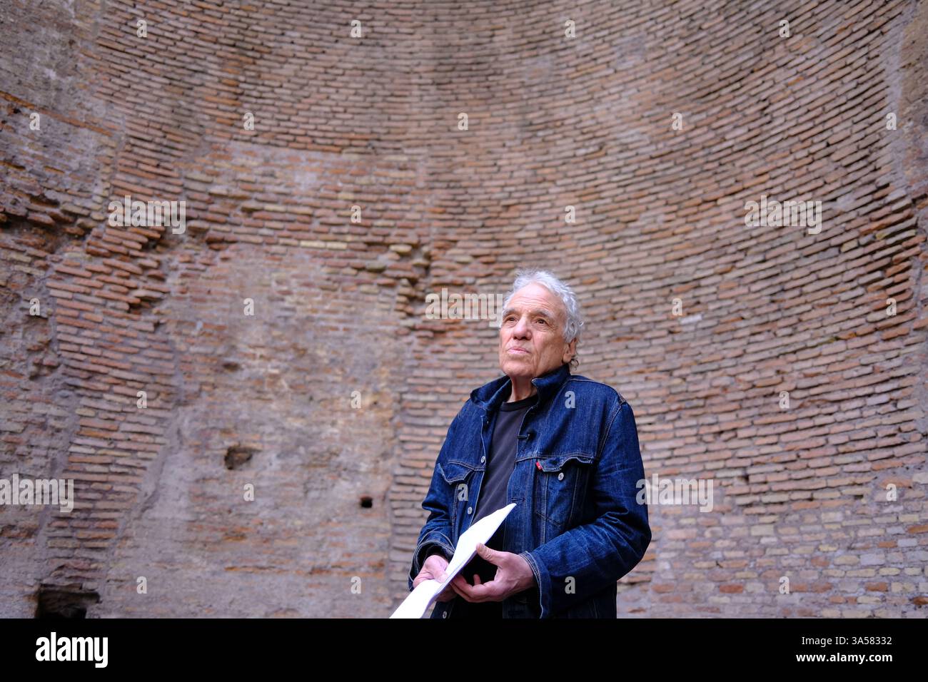 Rome, Italy. 21st Mar, 2025. Abel Ferrara poses for a photo during a ...