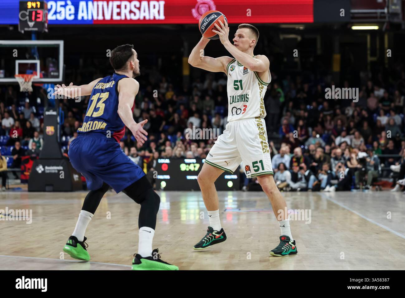Arnas Butkevicius of Zalgiris Kaunas and Tomas Satoransky of FC ...