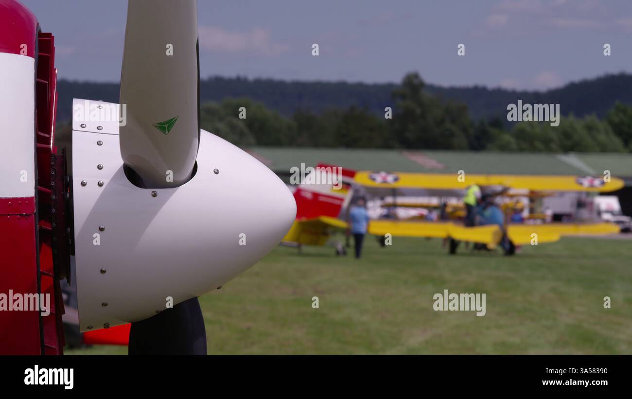 Air show, closeup of a motor with propeller of a historically old ...