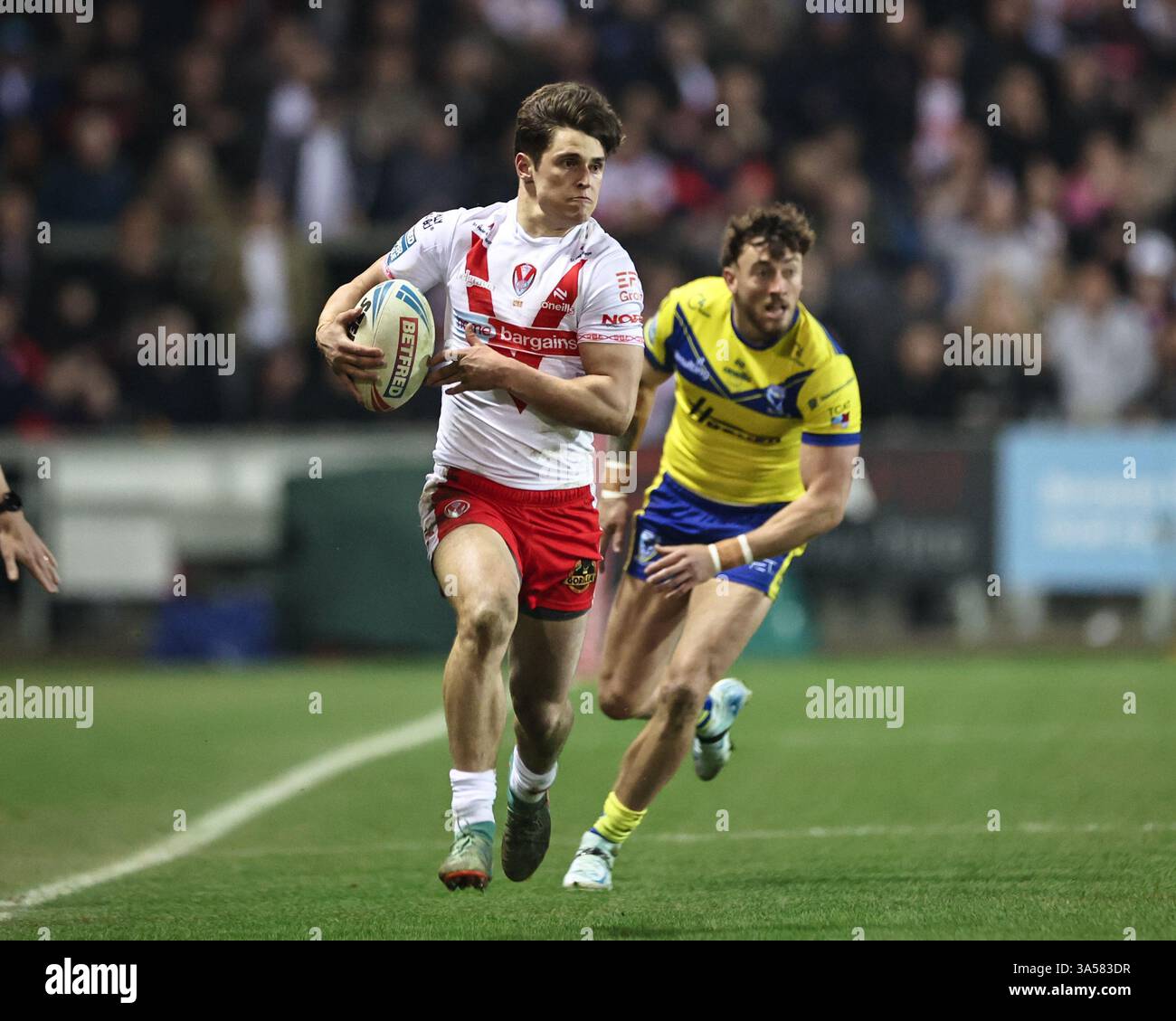 Jon Bennison of St. Helens breaks with the ball during the Betfred ...