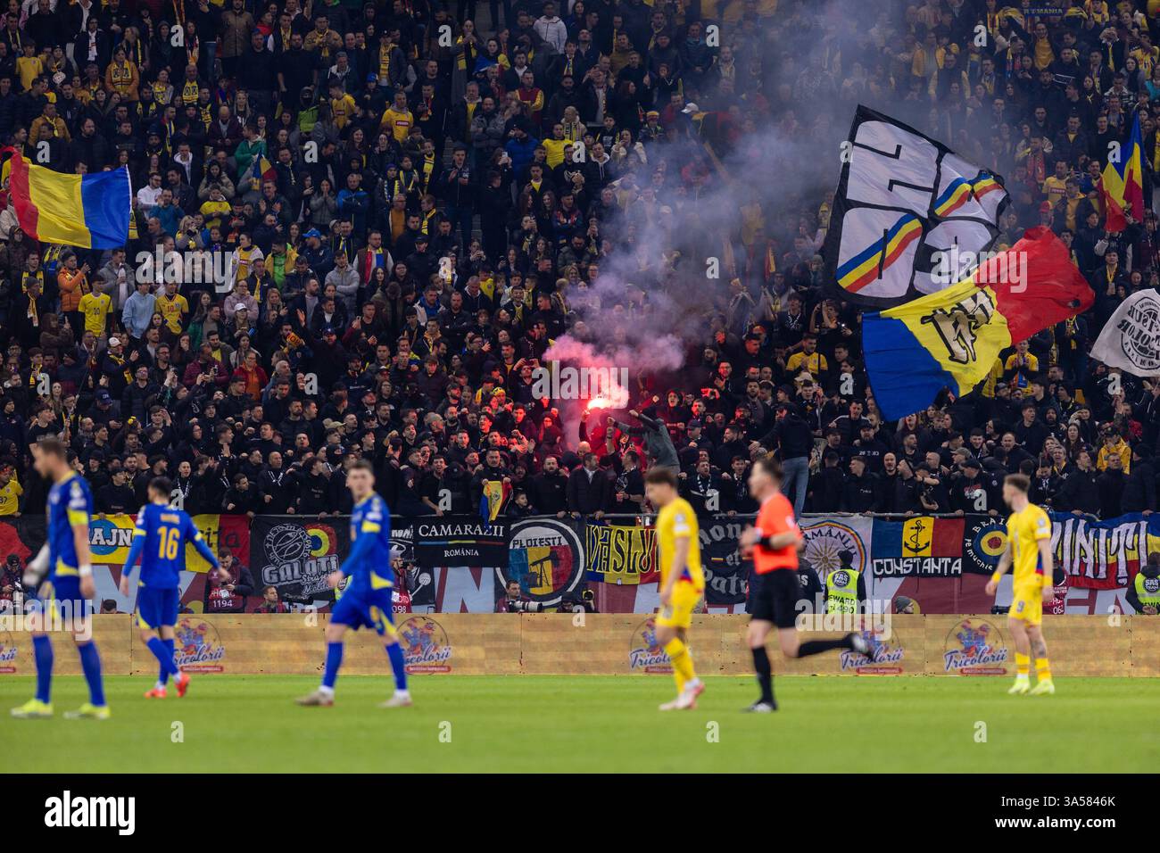 Romanian fans lighting a torch in the stands during the FIFA World Cup ...