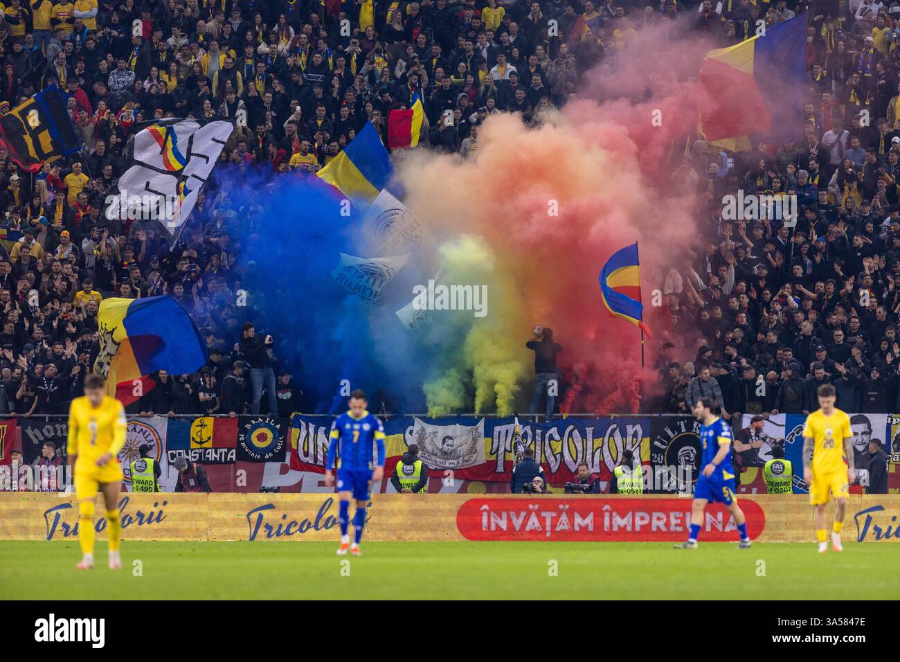 Romanian fans creating the Romanian Flag using torches during the FIFA ...