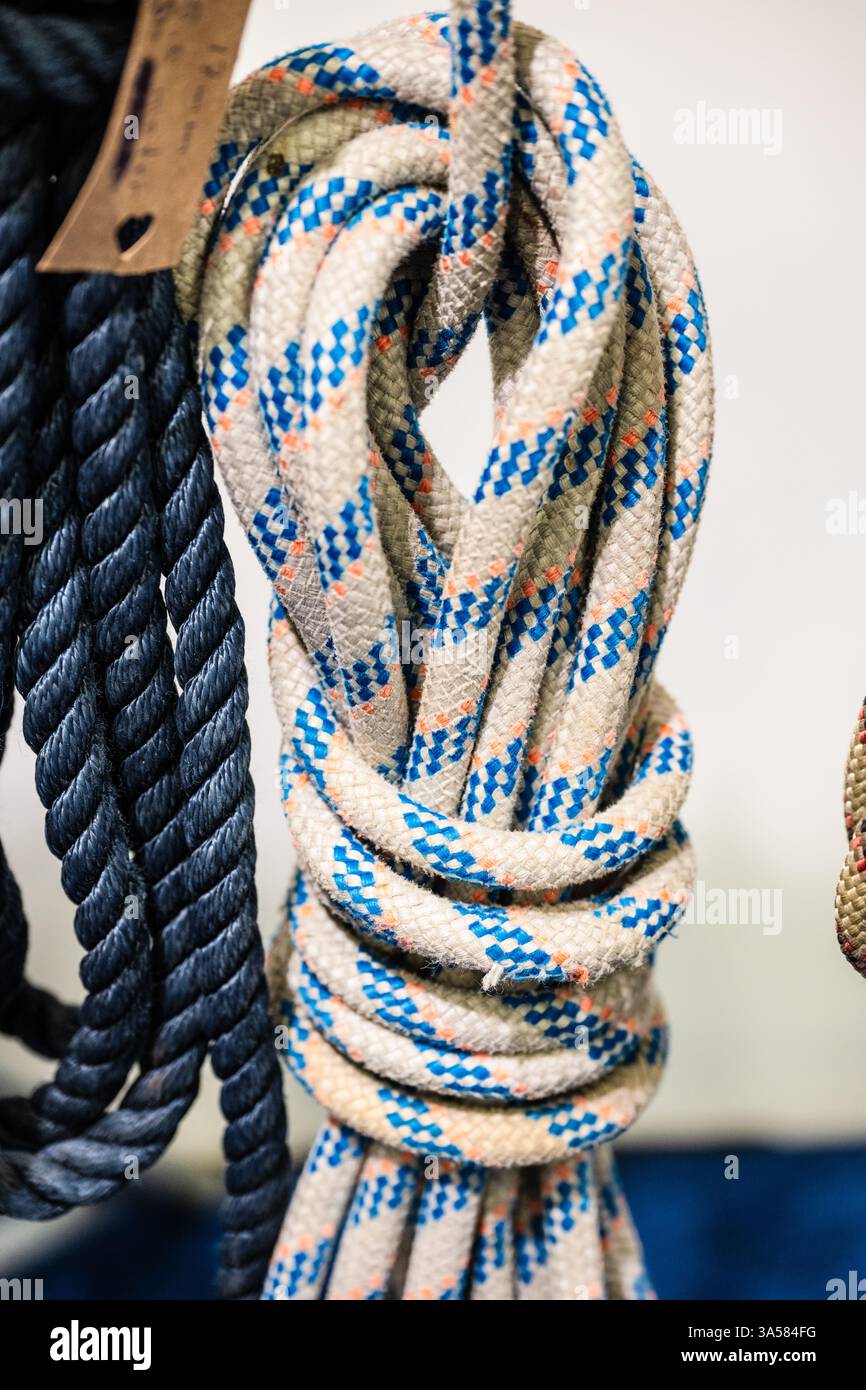 close-up of braided and twisted ropes hanging side by side Stock Photo ...