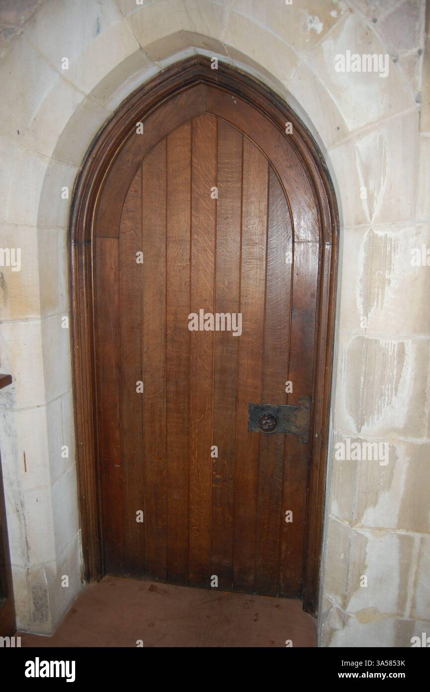 Oak door in a stone archway, in the 17th century Ellingham Hall ...