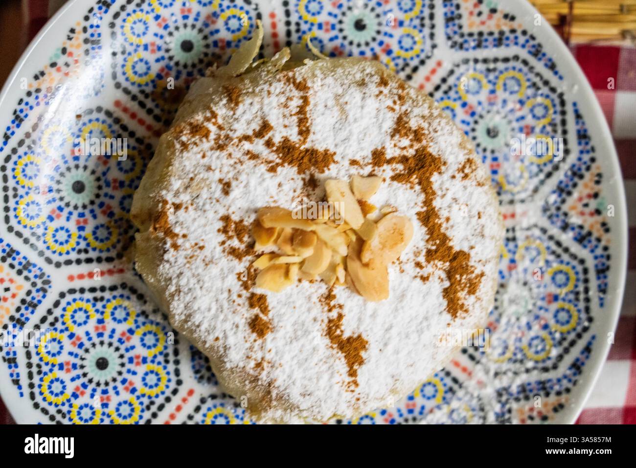 Moroccan pastilla, puff pastry filled with onion, chicken, parsley, and ...
