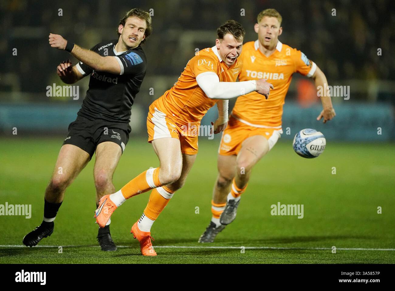 Sale Sharks' Tom Roebuck and Newcastle Falcons' Max Clark (left) in ...