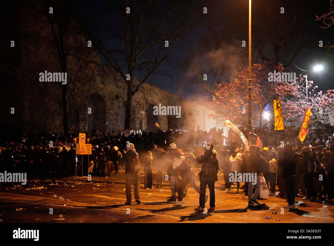 Protesters throw objects during clashes with anti riot police officers ...