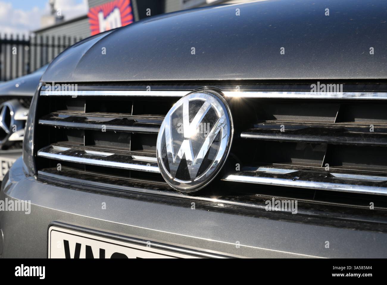 Iconic Volkswagen Badge on Car Exterior Stock Photo - Alamy