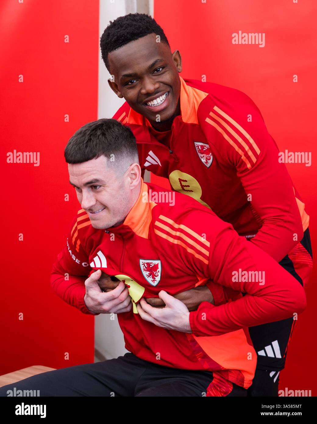 PONTYCLUN, WALES - 21 MARCH 2025: Wales' Tom Lockyer and Wales' Tom ...