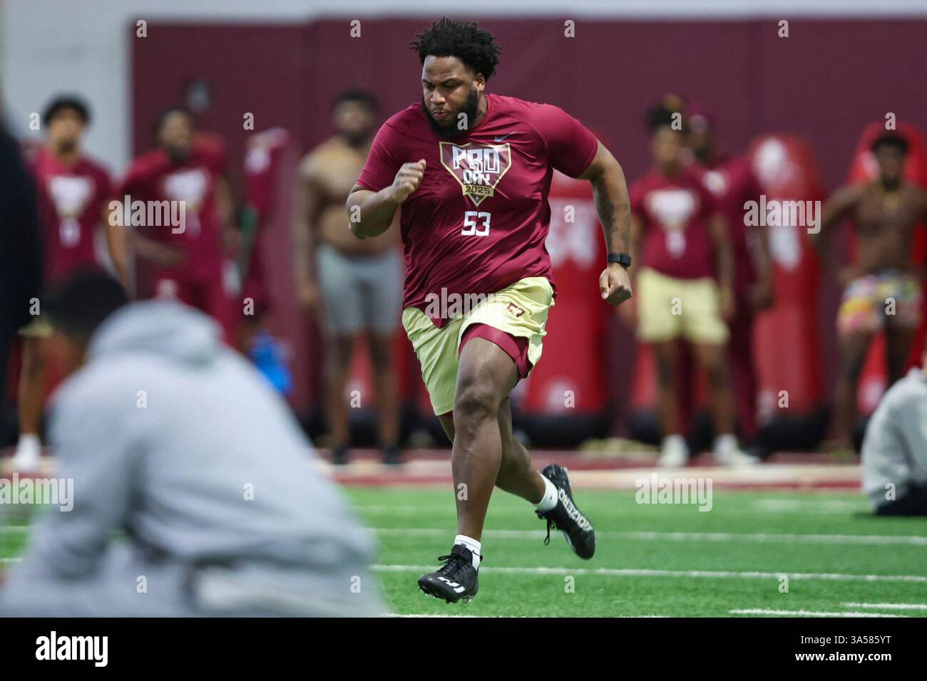Florida State offensive lineman Maurice Smith runs a 40-yard dash ...