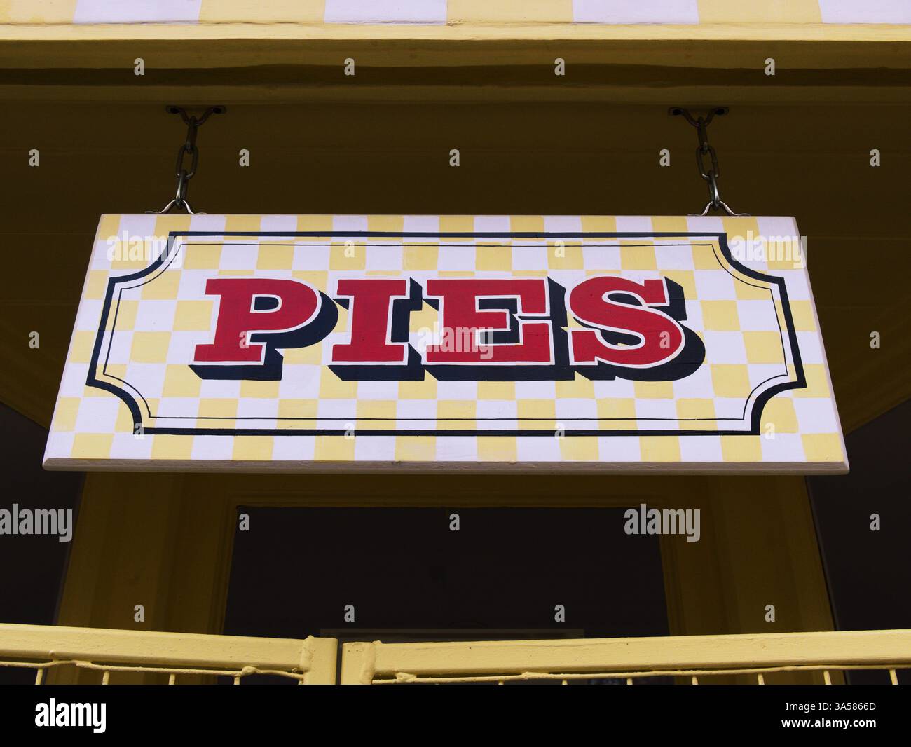 'Pies' sign - old fashioned red text with light yellow background Stock ...