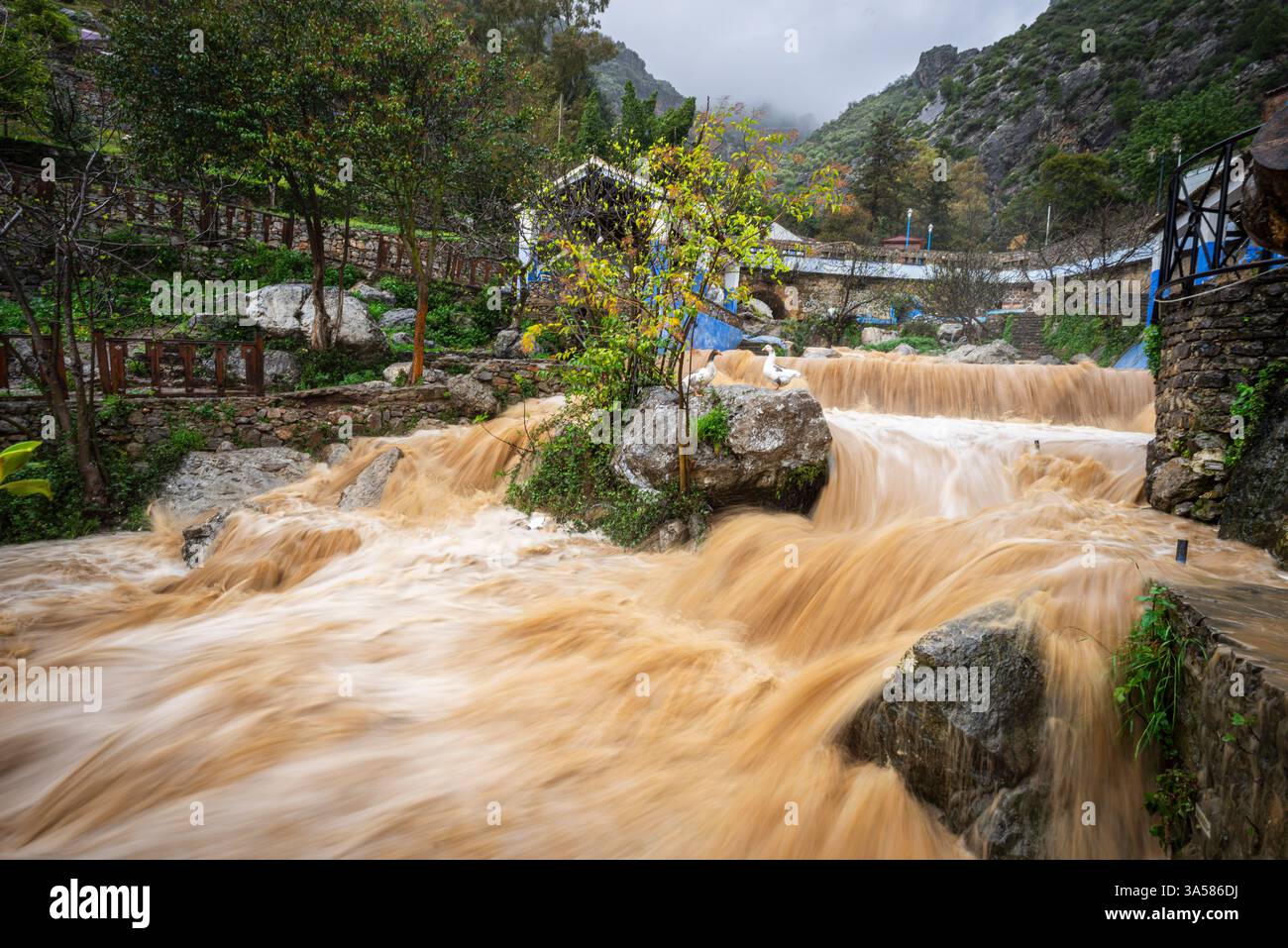 torrential rain and swollen river, Ras el Maa fountain , Chefchaouen ...