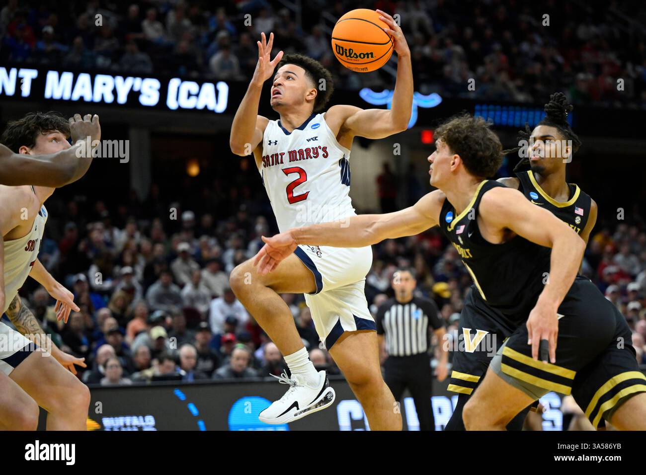 Saint Mary's guard Jordan Ross (2) drives to the basket past Vanderbilt ...