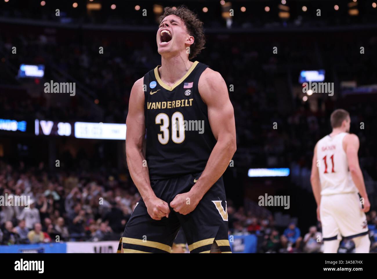 Cleveland, United States. 21st Mar, 2025. Vanderbilt guard Chris Manon ...