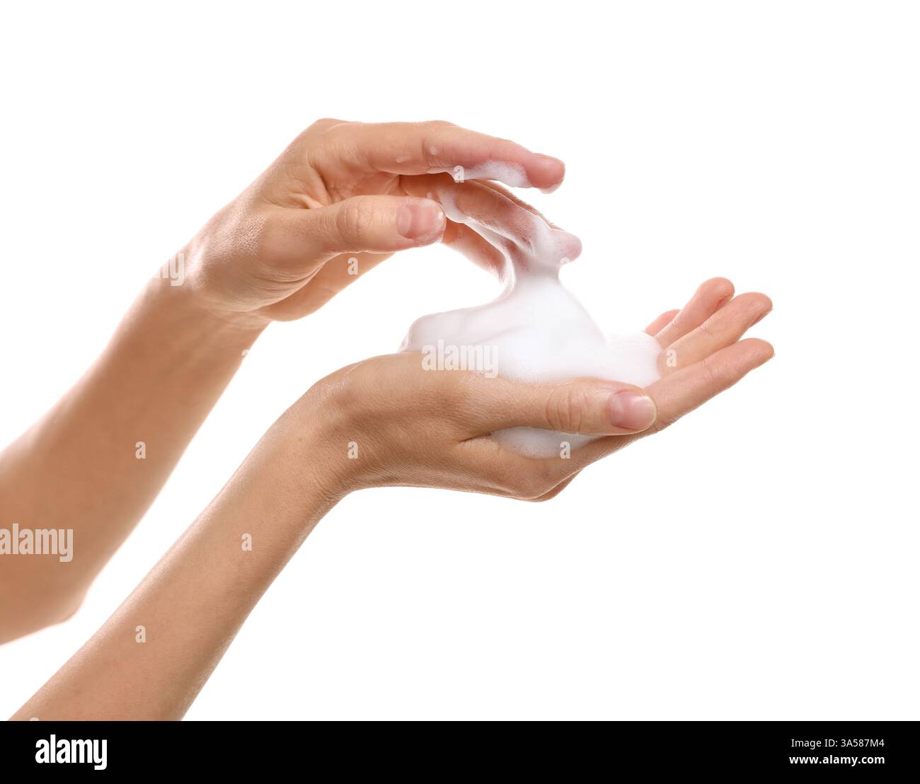 Woman washing hands with foaming soap on white background, closeup ...