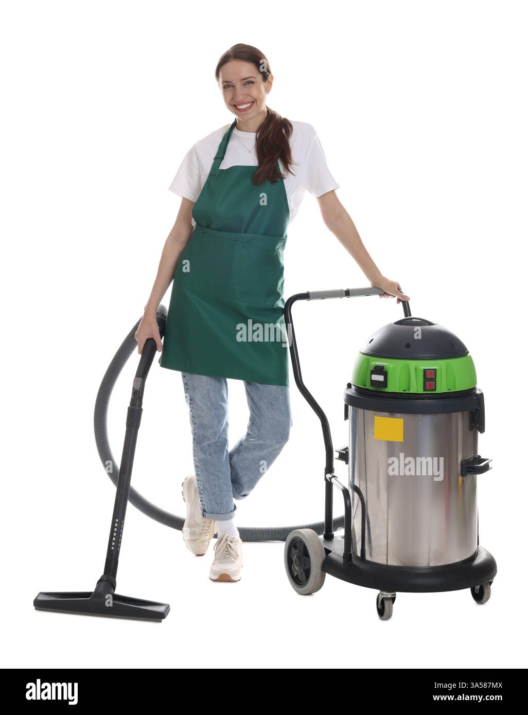 Smiling cleaning service worker with vacuum cleaner on white background ...