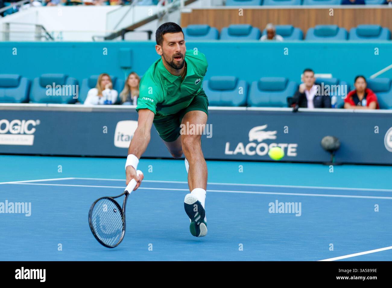 MIAMI GARDENS, FL - MARCH 21: Novak Djokovic (SRB) in action during his ...