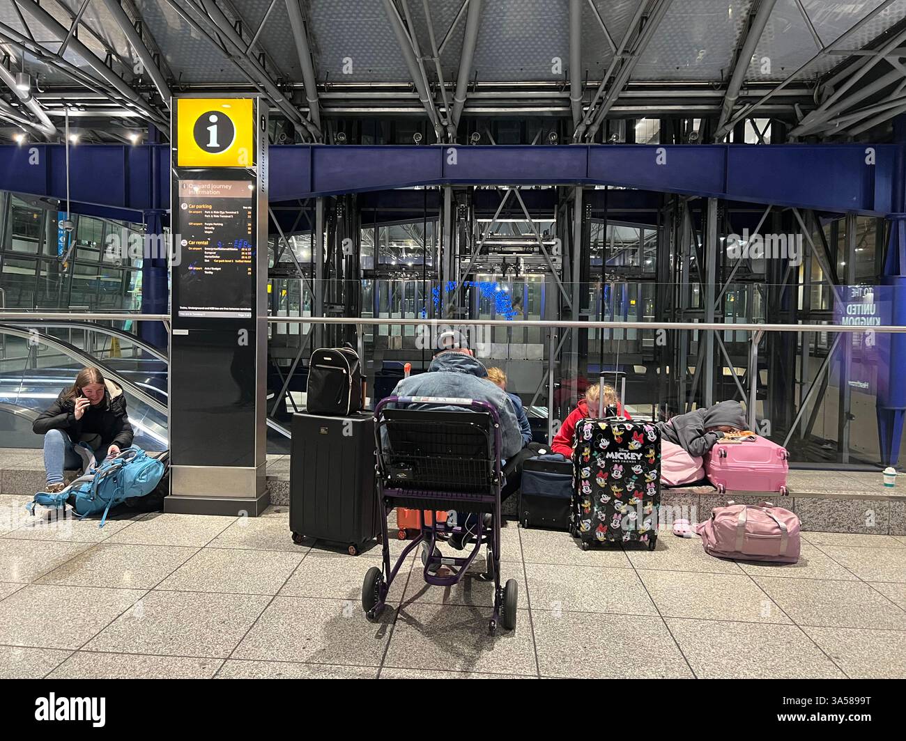 Stranded passengers at Heathrow Terminal 5 in London. British Airways ...