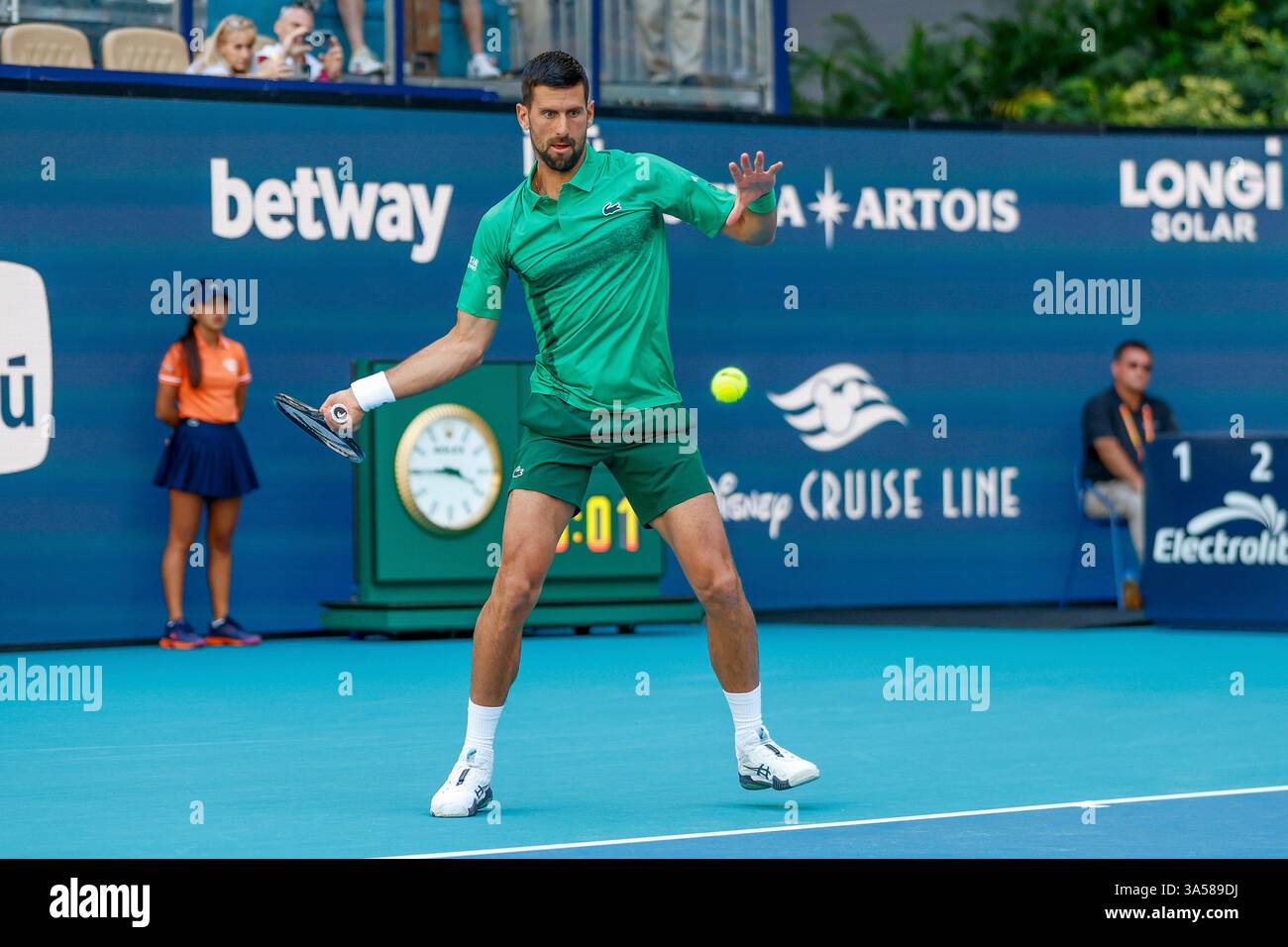MIAMI GARDENS, FL - MARCH 21: Novak Djokovic (SRB) in action during his ...