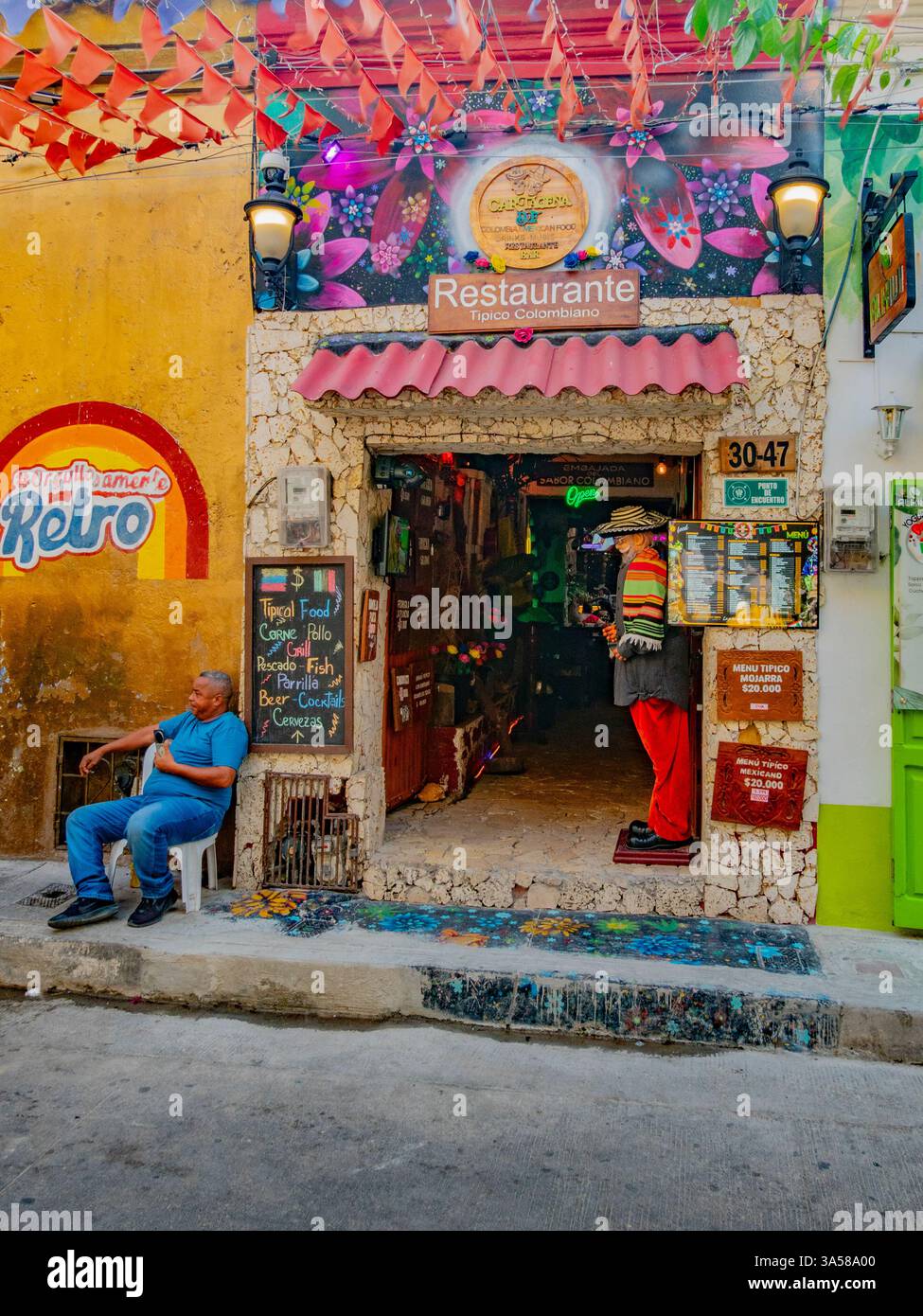 Entrance of a typical Colombian restaurant in the Getsemani ...