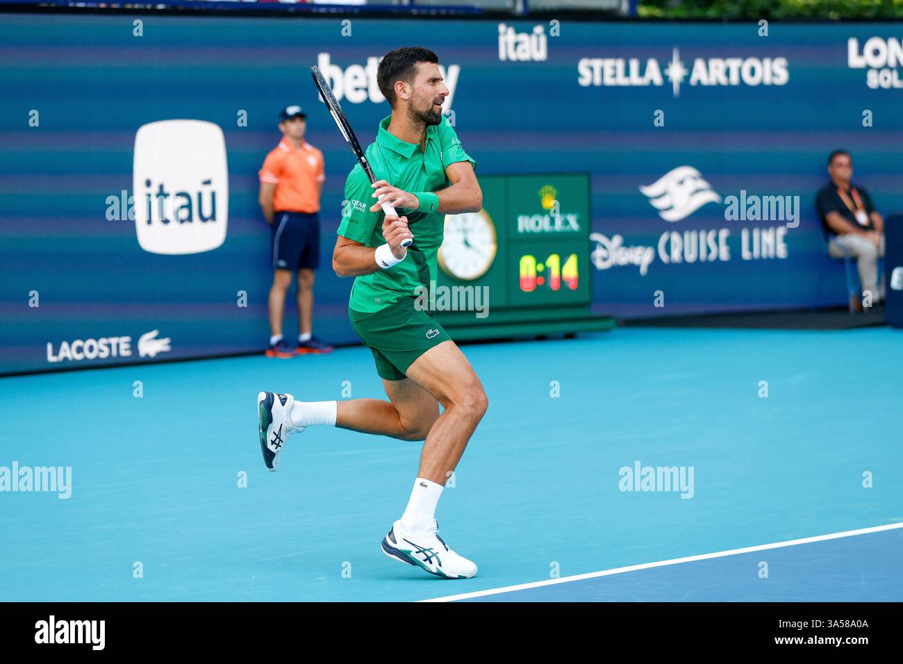 MIAMI GARDENS, FL - MARCH 21: Novak Djokovic (SRB) in action during his ...