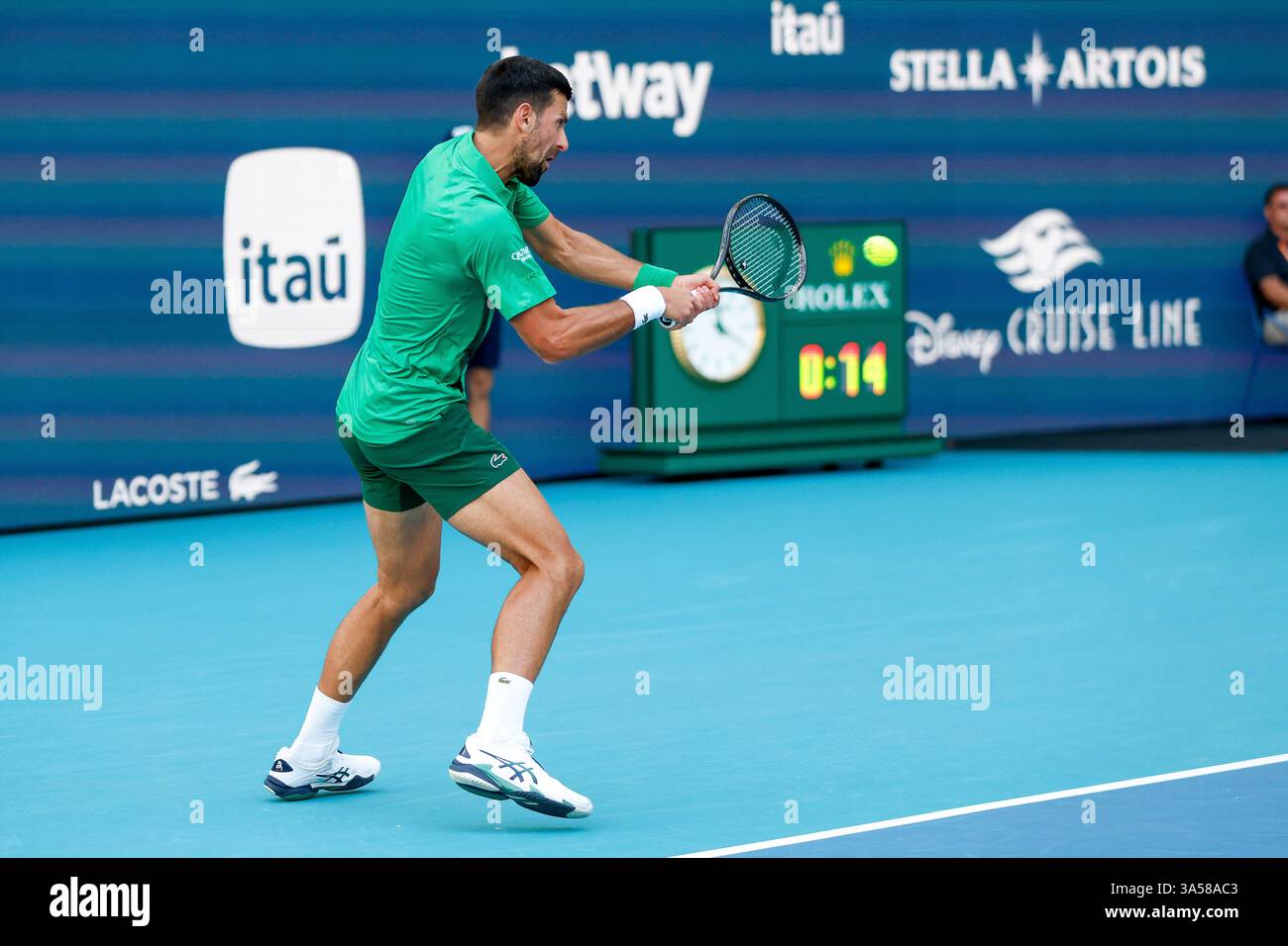 MIAMI GARDENS, FL - MARCH 21: Novak Djokovic (SRB) in action during his ...