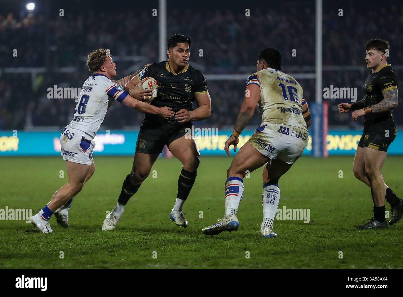 Herman Ese’Ese looks for a way through *** during the Super League ...