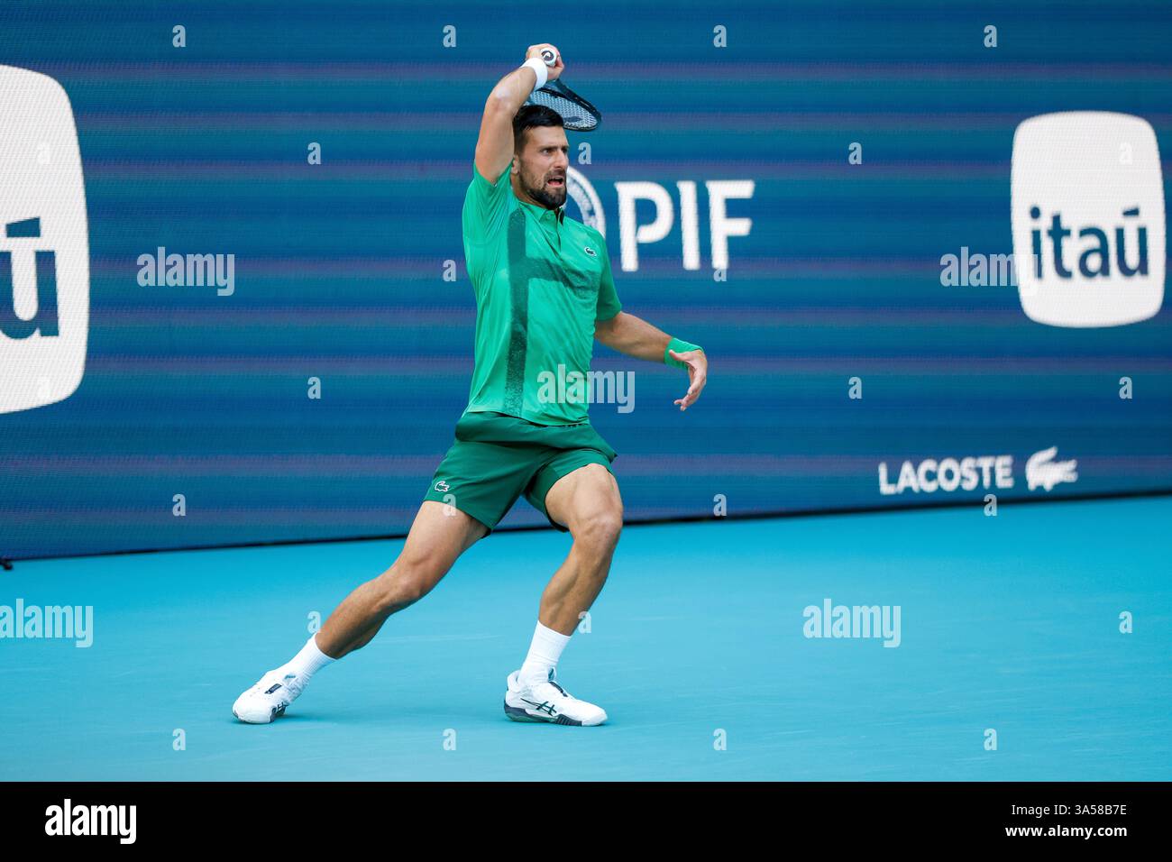 MIAMI GARDENS, FL - MARCH 21: Novak Djokovic (SRB) in action during his ...