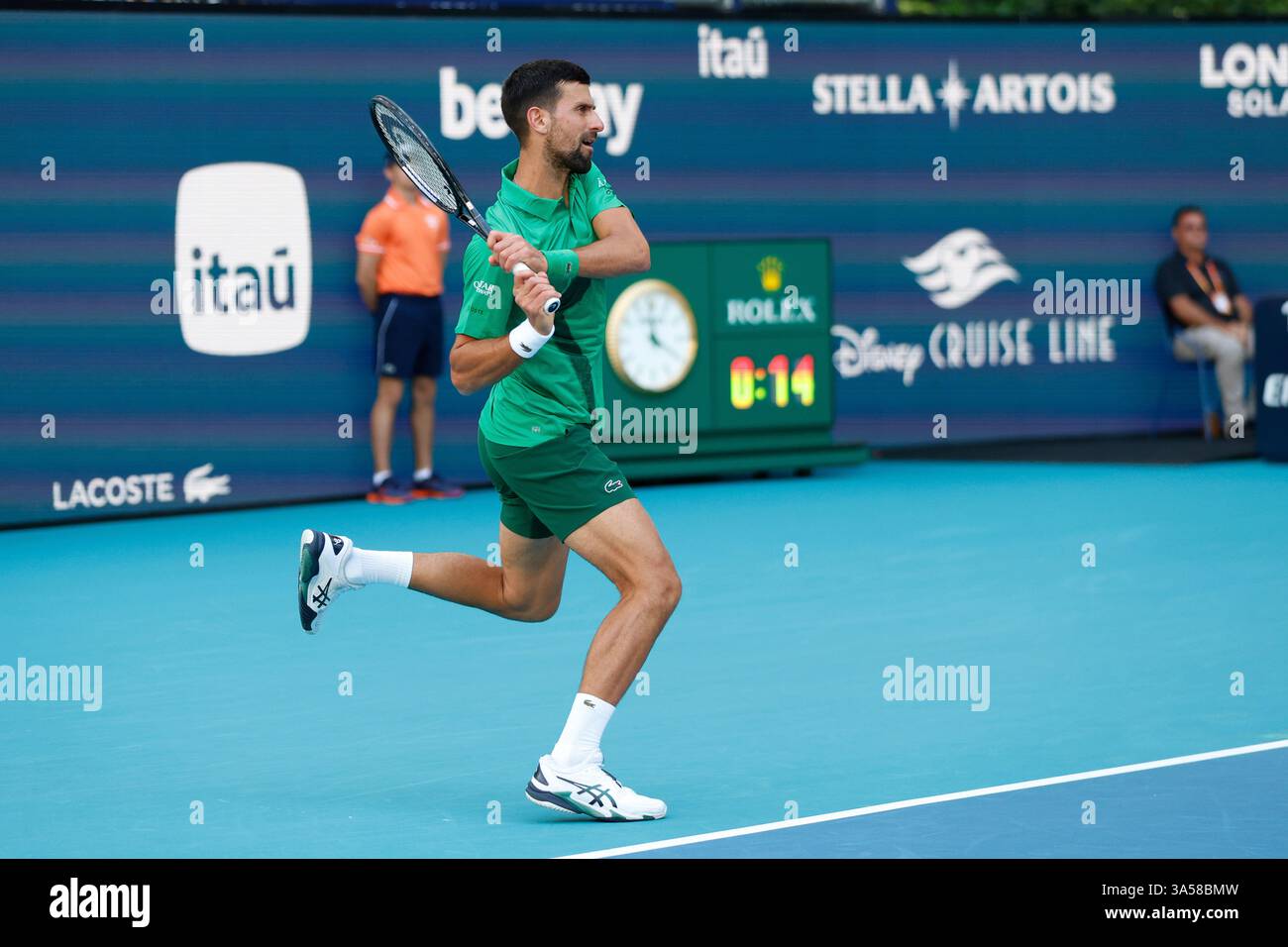MIAMI GARDENS, FL - MARCH 21: Novak Djokovic (SRB) in action during his ...