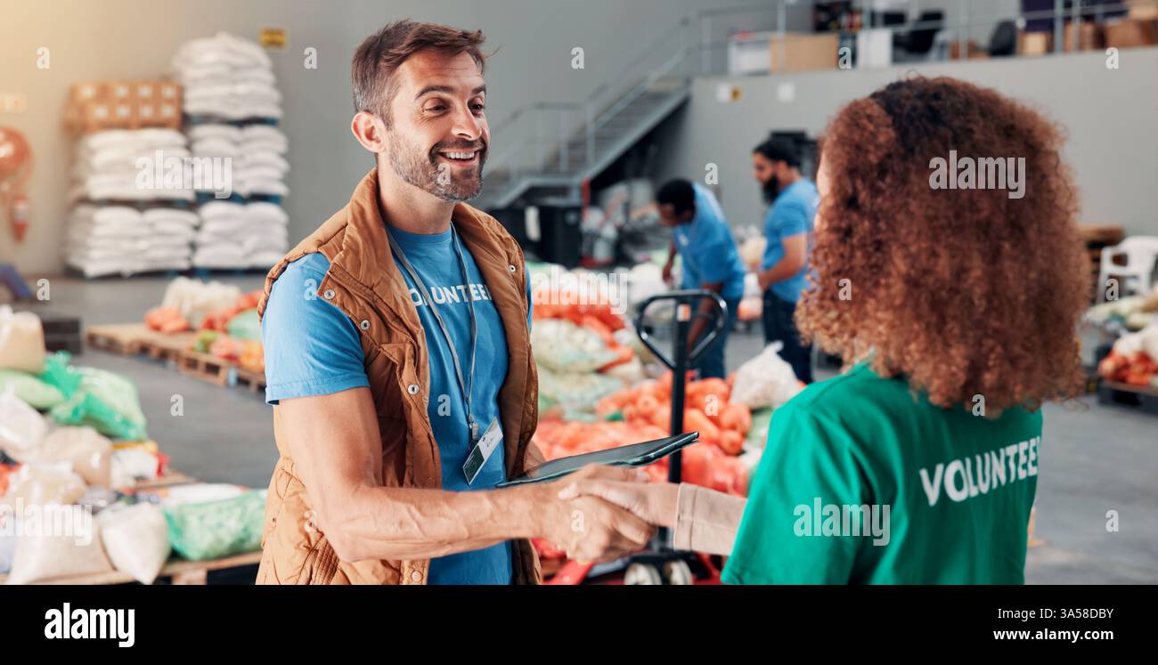 Handshake, happy and volunteers for non profit at food drive, charity ...