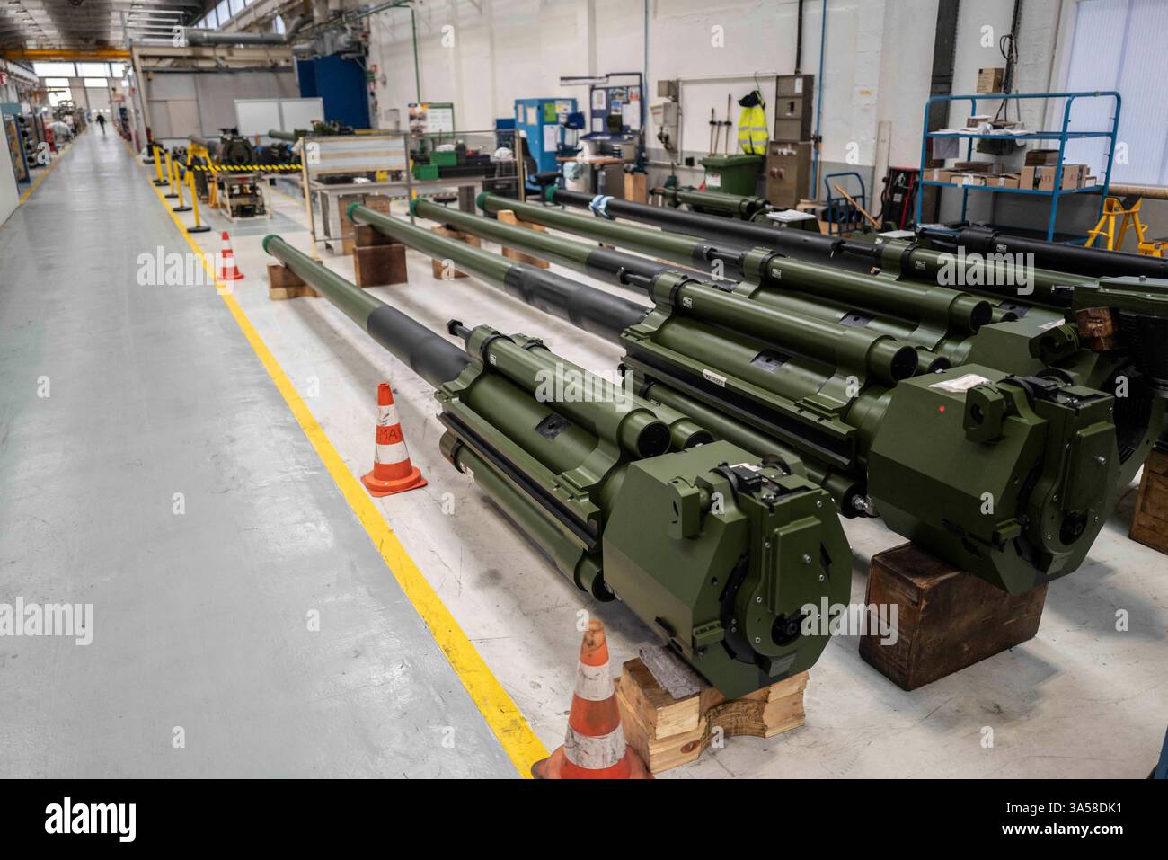 This photograph shows 40 millimeter tubes for Caesar cannons during a ...