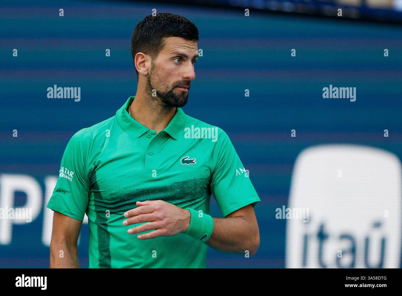 MIAMI GARDENS, FL - MARCH 21: Novak Djokovic (SRB) in action during his ...