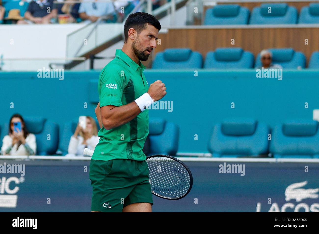 MIAMI GARDENS, FL - MARCH 21: Novak Djokovic (SRB) in action during his ...