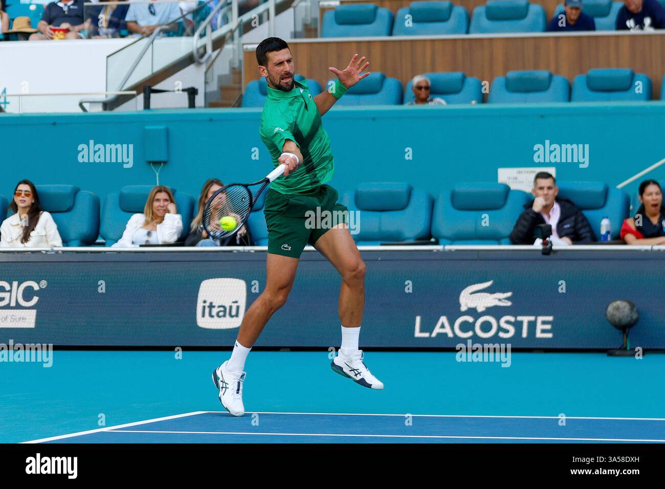 MIAMI GARDENS, FL - MARCH 21: Novak Djokovic (SRB) in action during his ...
