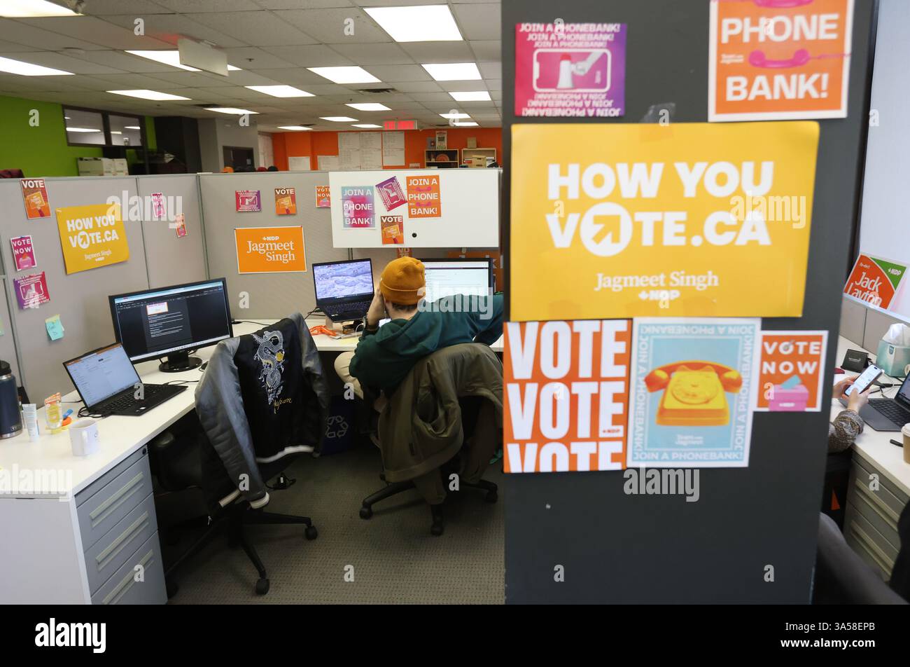 A New Democratic Party campaign team member works at the NDP ...