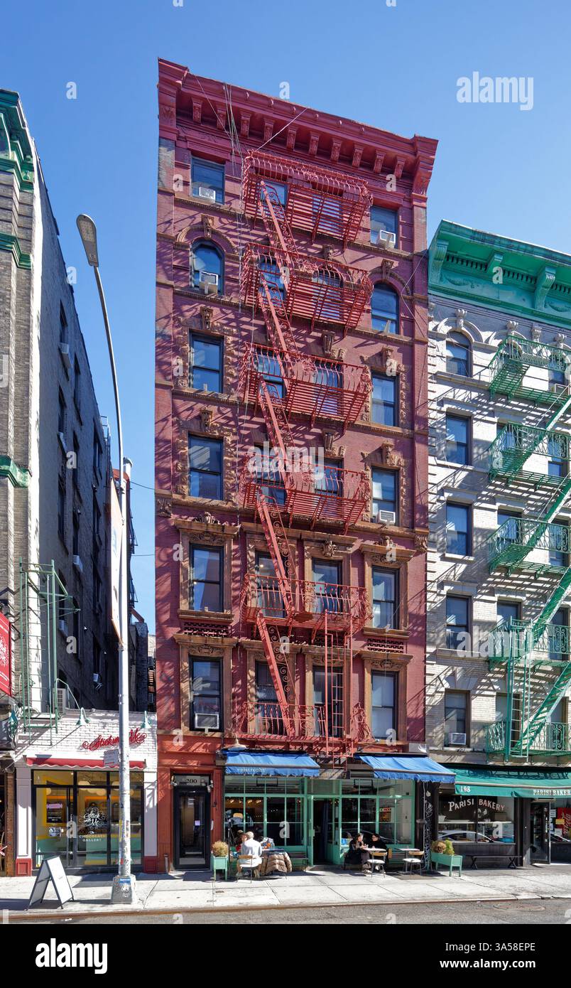 200 Mott Street is a red roman brick apartment building with tan terra ...
