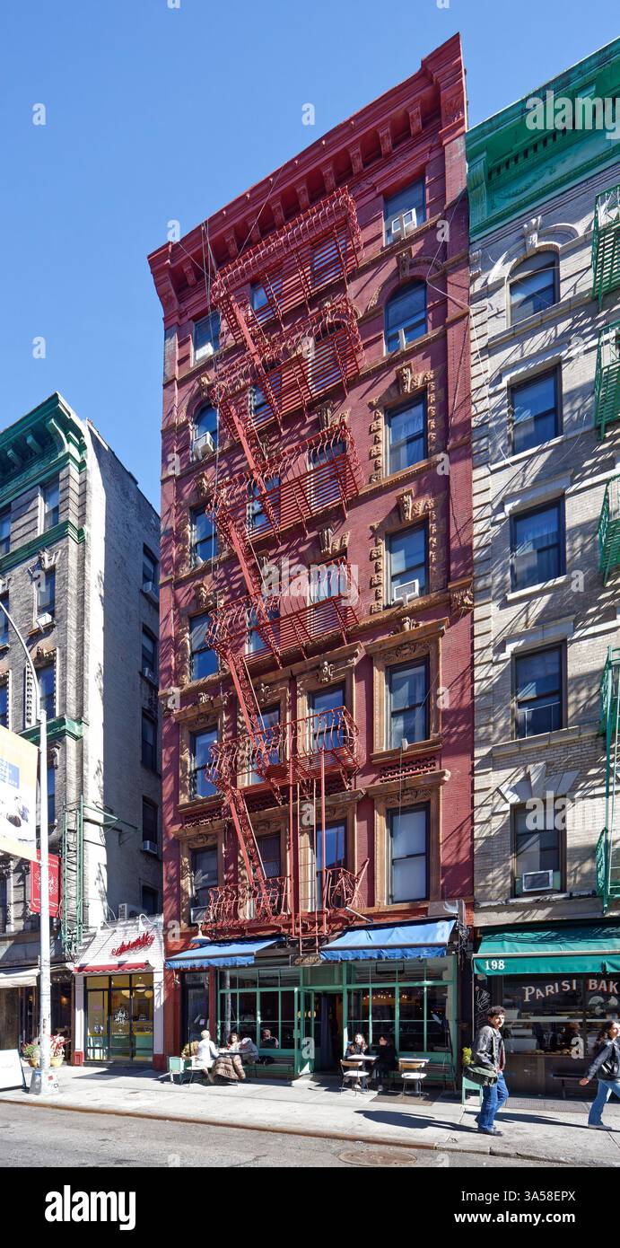 200 Mott Street is a red roman brick apartment building with tan terra ...