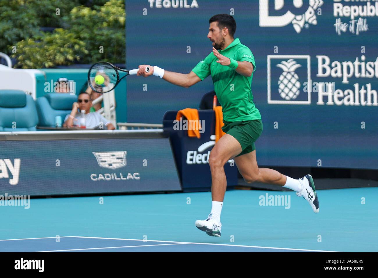 MIAMI GARDENS, FL - MARCH 21: Novak Djokovic (SRB) in action during his ...