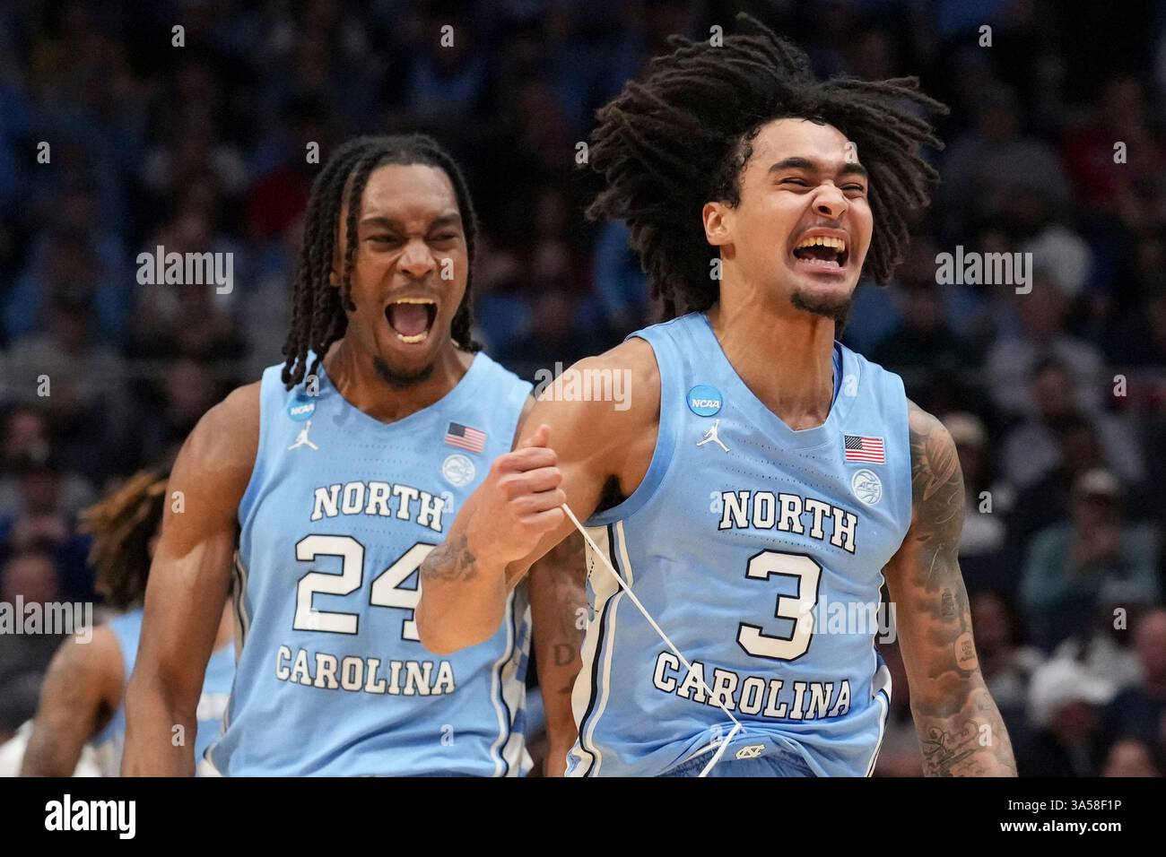 North Carolina's Elliot Cadeau (3) celebrates with teammate Jae'Lyn ...