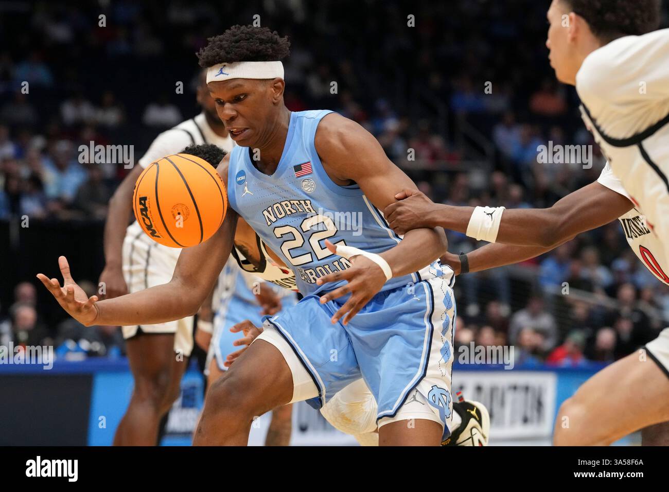 North Carolina forward Ven-Allen Lubin (22) chases a loose ball during ...