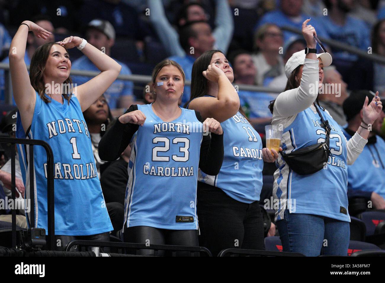 North Carolina fans cheer during a First Four college basketball game ...