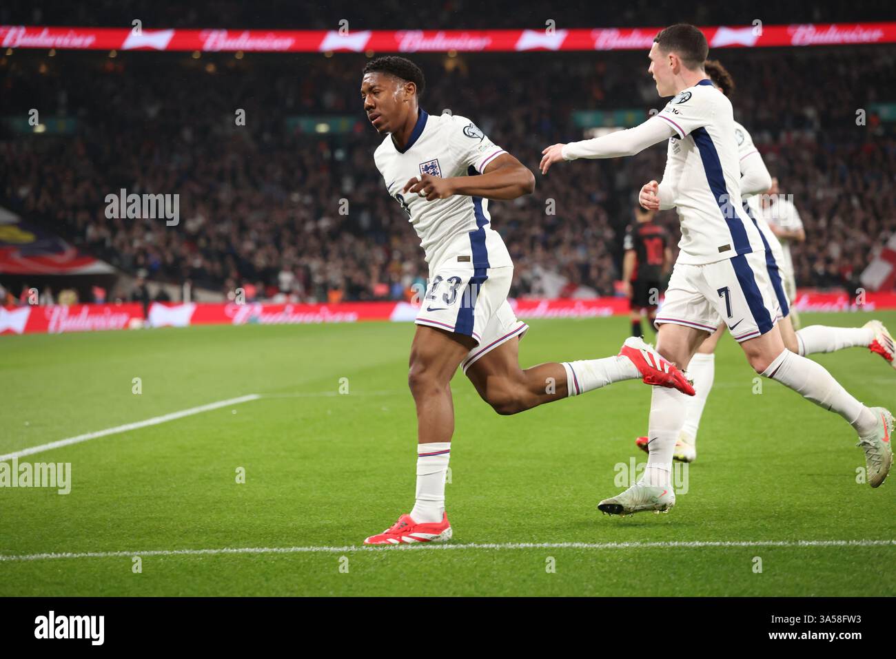 London, UK. 21st Mar, 2025. Myles Lewis-Skelly (E) celebrates scoring ...