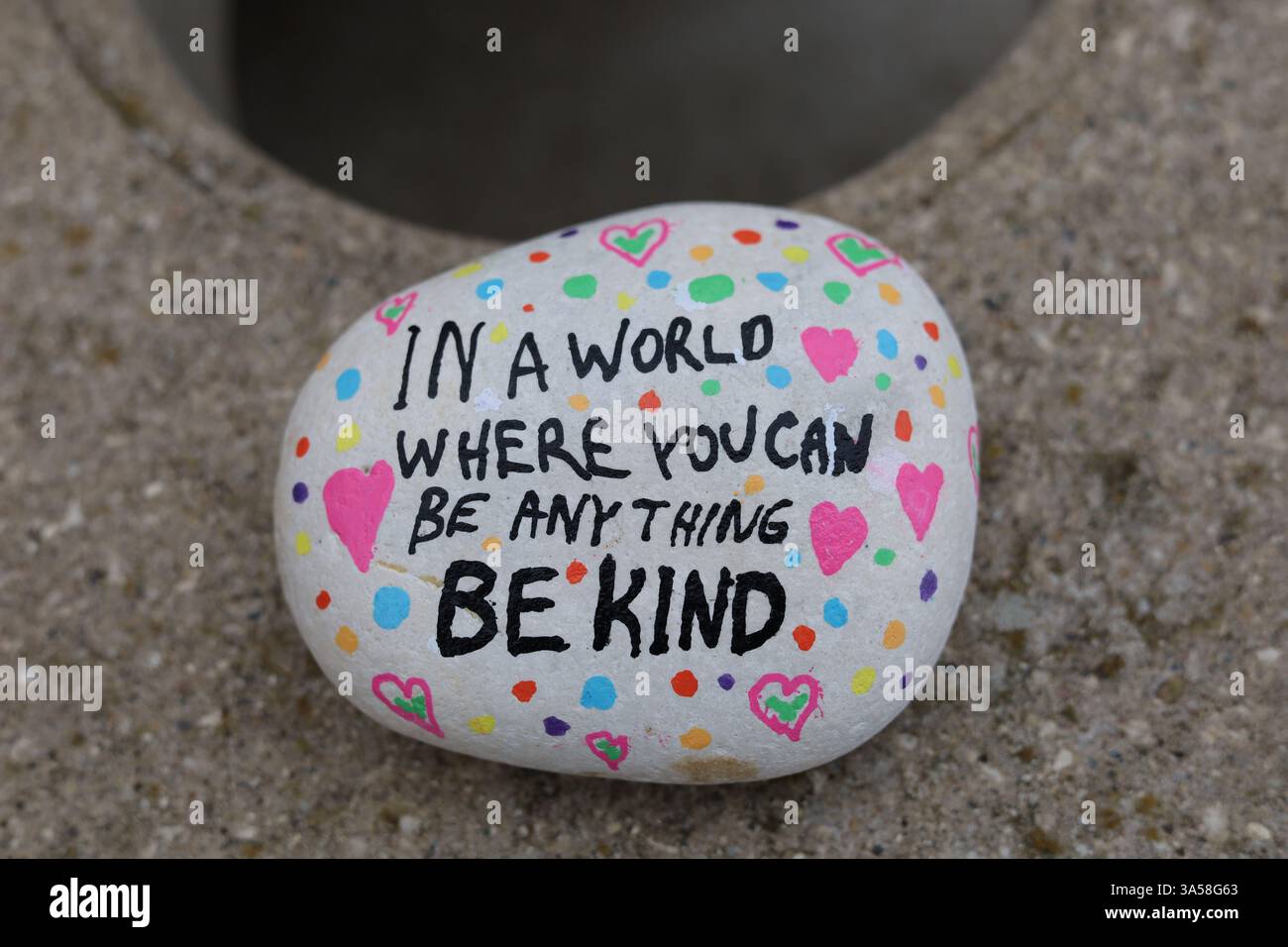 In a world where you can be anything be kind kindness rock by concrete ...