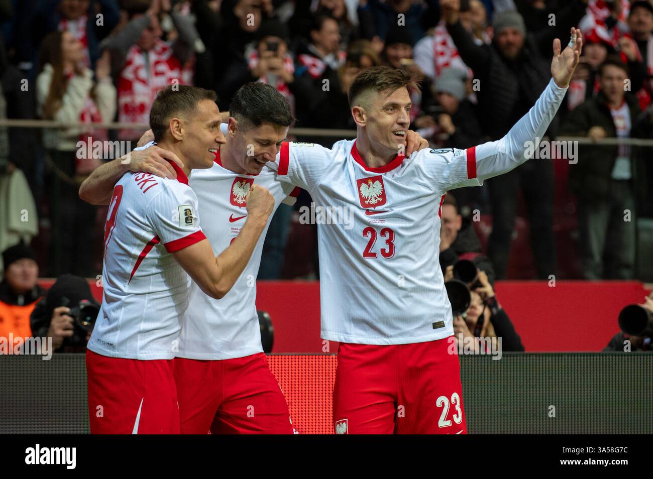 Robert Lewandowski of Poland celebrates scoring with Krzysztof Pi?tek ...