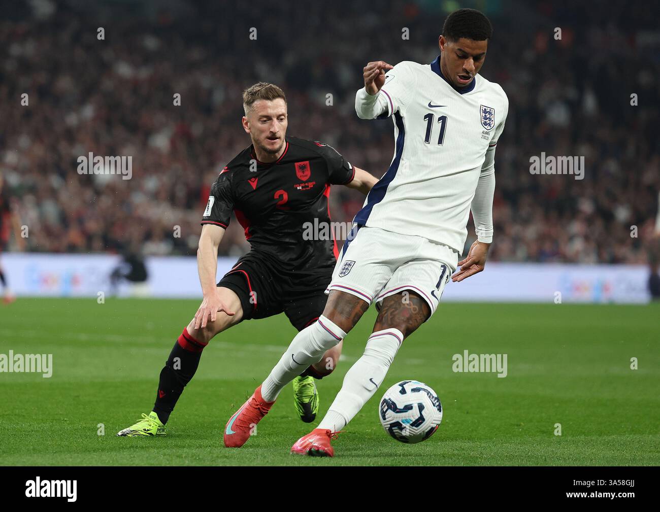 London, England, 21st March 2025. Marcus Rashford of England and Iván ...