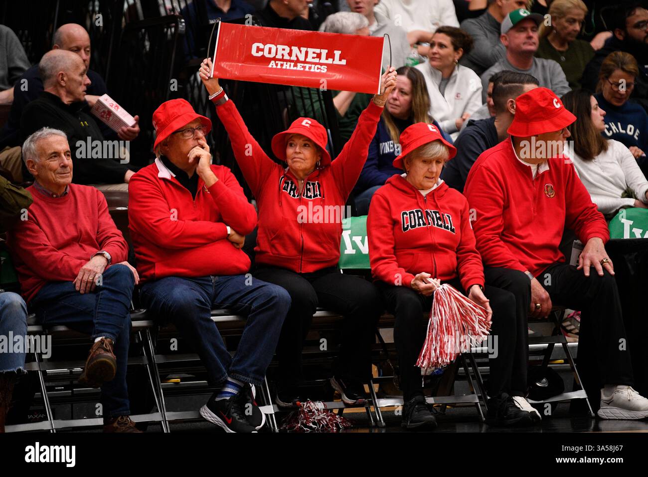 PROVIDENCE, RI - MARCH 16: A Cornell Big Red fan holds up a "Cornell Athletics" sign during the ...
