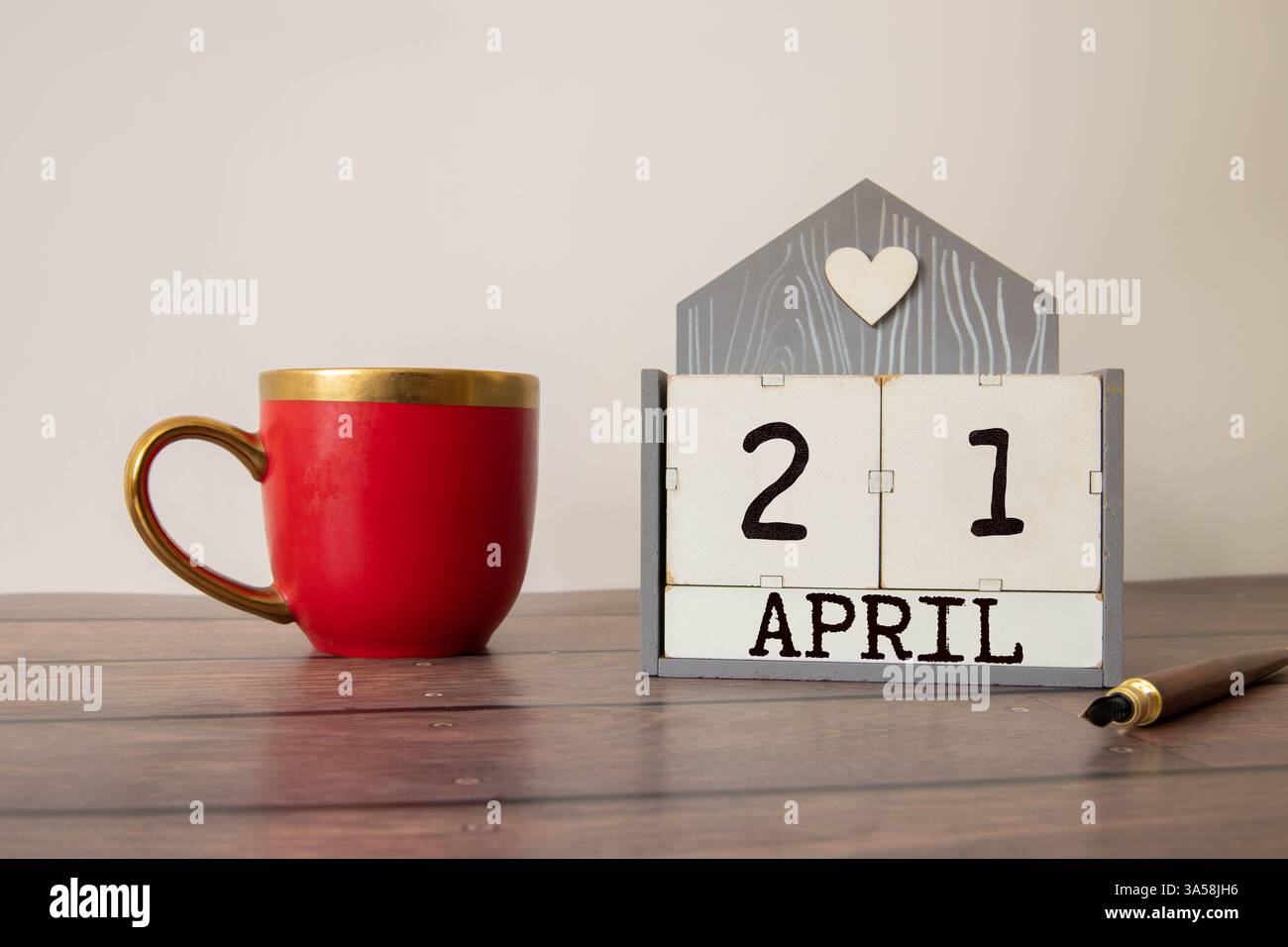 Flower pot and calendar for the snow season from 21 April. Spring time ...